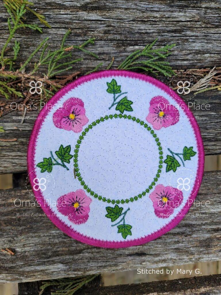 Pansy Candle Mat (5×7) · Oma’s Place Machine Embroidery Designs